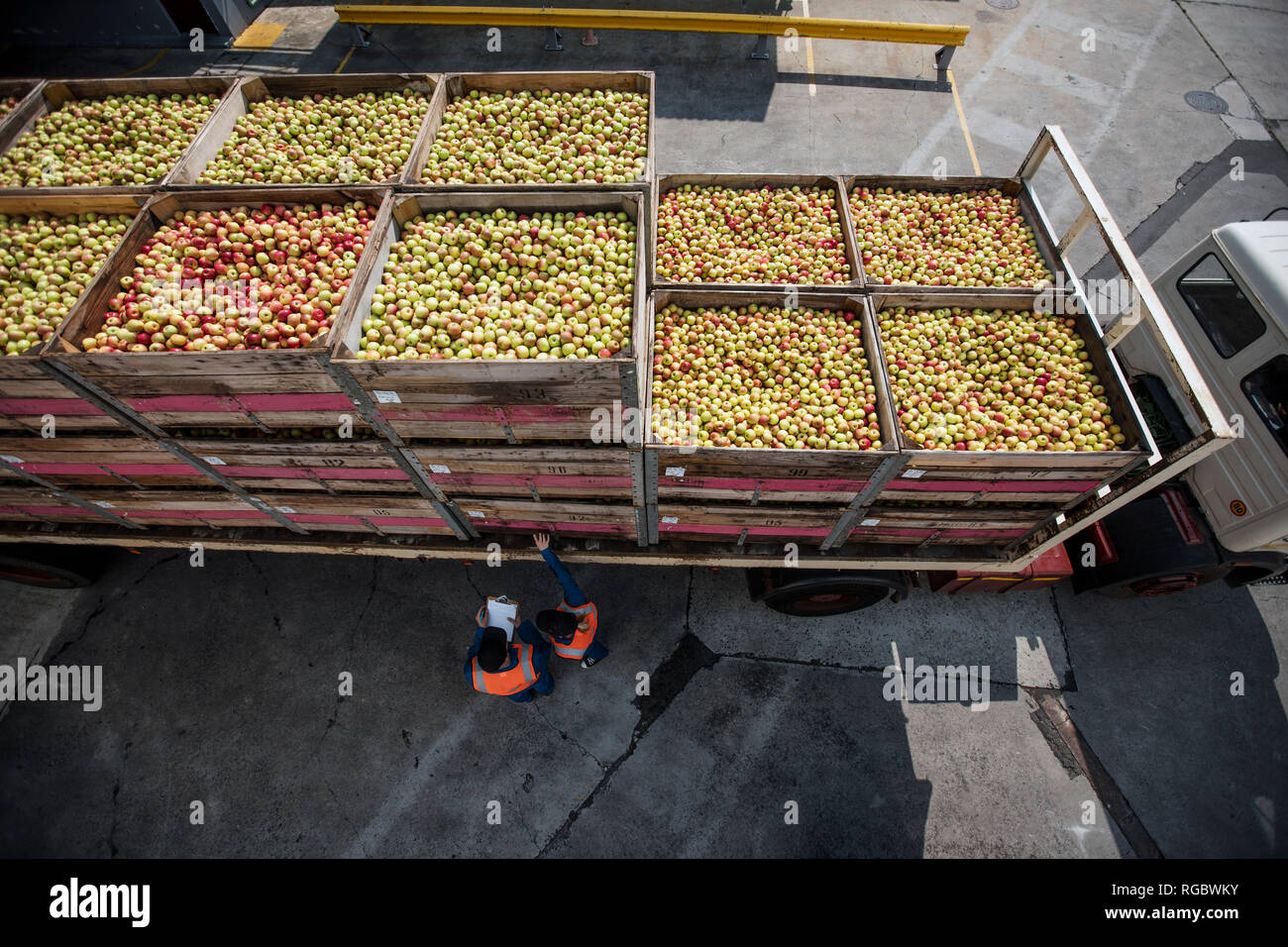Truck transporting apples Stock Photo - Alamy