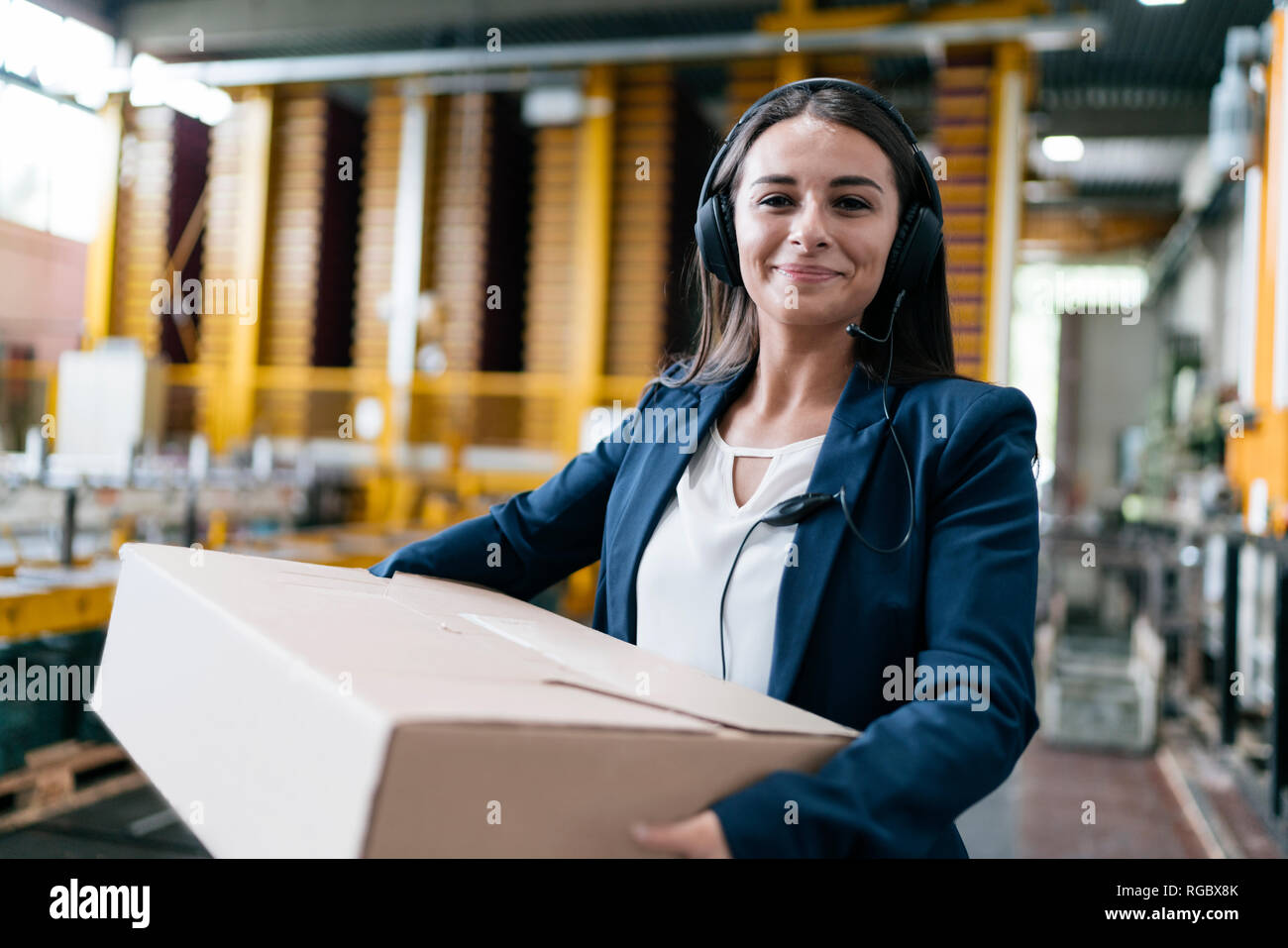 Carrying parcel hi-res stock photography and images - Alamy
