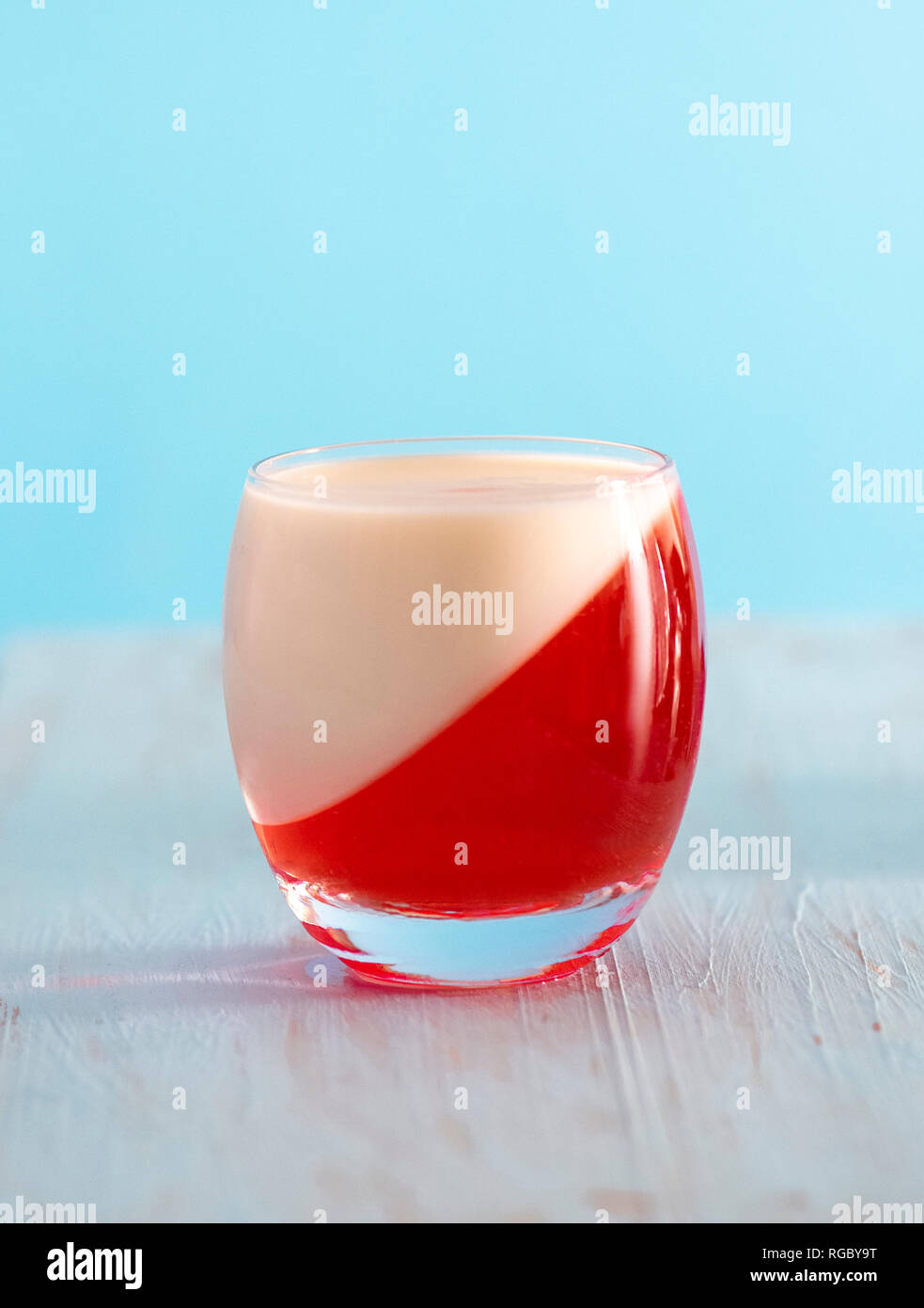 Italian cold dessert Panna Cotta on blue background Stock Photo - Alamy