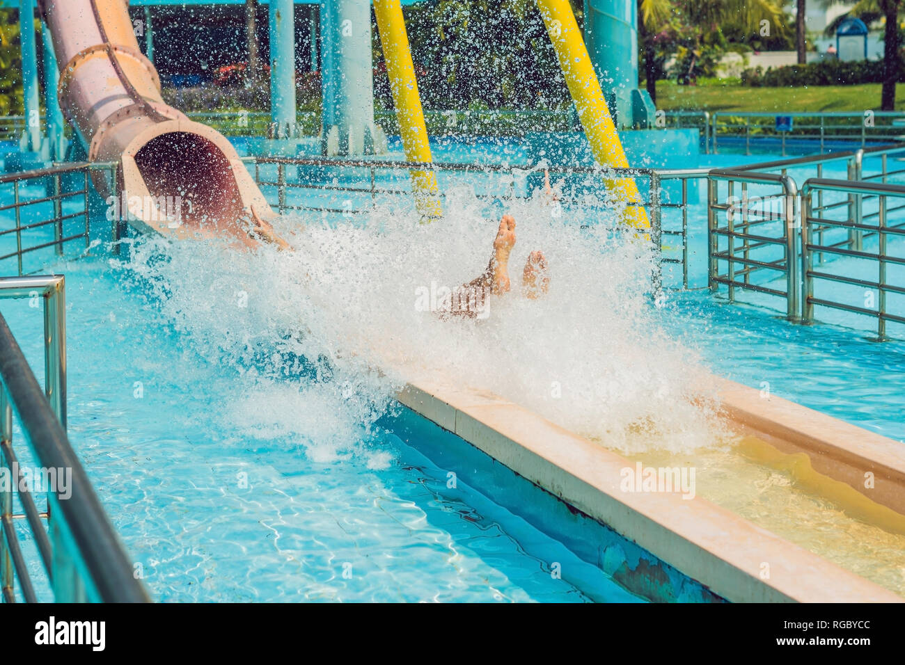 Man having fun at water park Stock Photo - Alamy