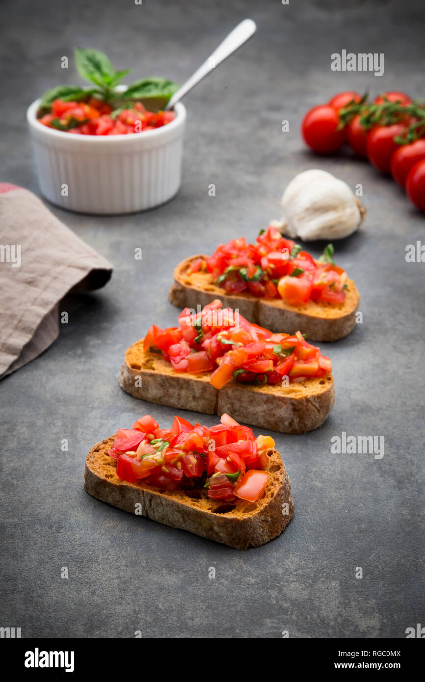 Bruschetta with tomato, basil, garlic and white bread Stock Photo - Alamy