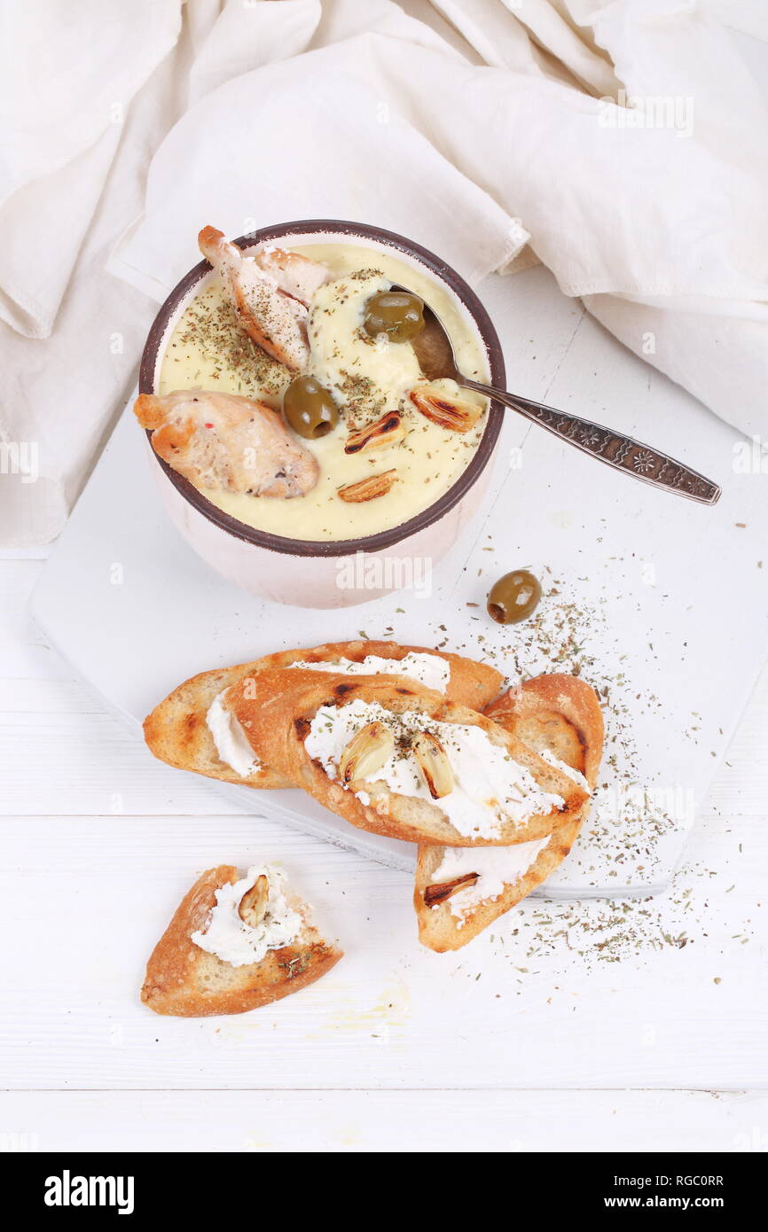 French puree soup with parsnip, soft cheese baguette Stock Photo - Alamy