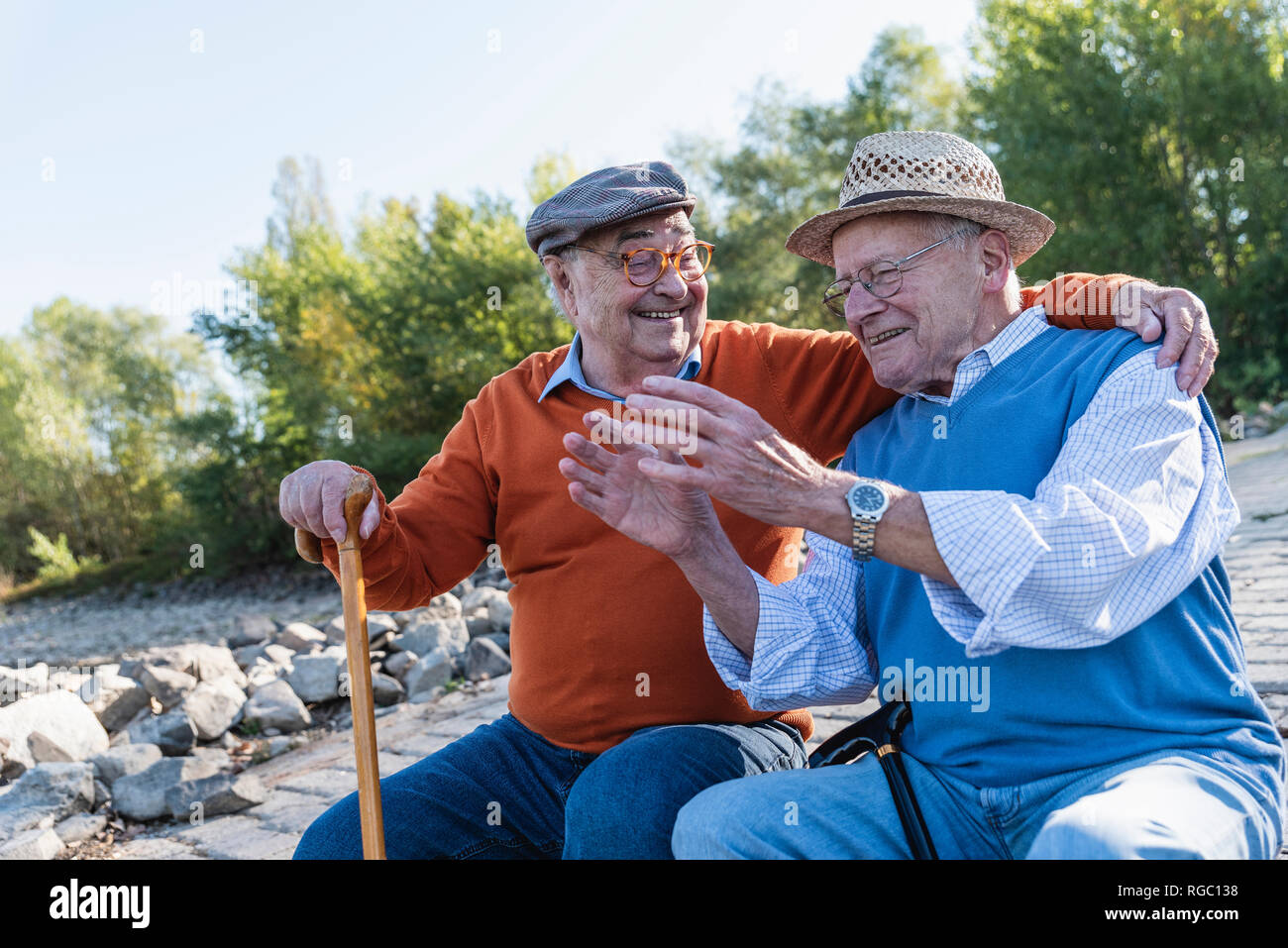 Old friends laughing together hi-res stock photography and images - Alamy