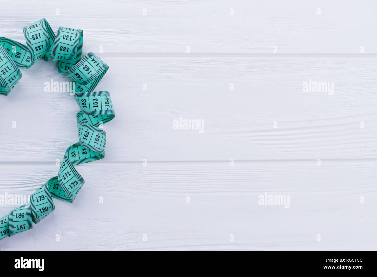 Twisted measuring tape hi-res stock photography and images - Alamy