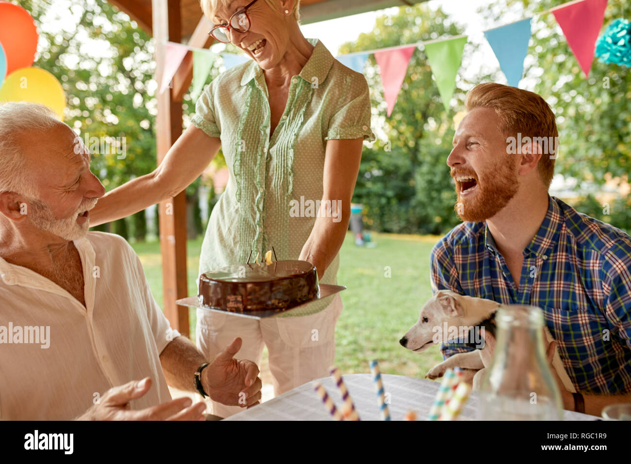 Handing cake hi-res stock photography and images - Alamy