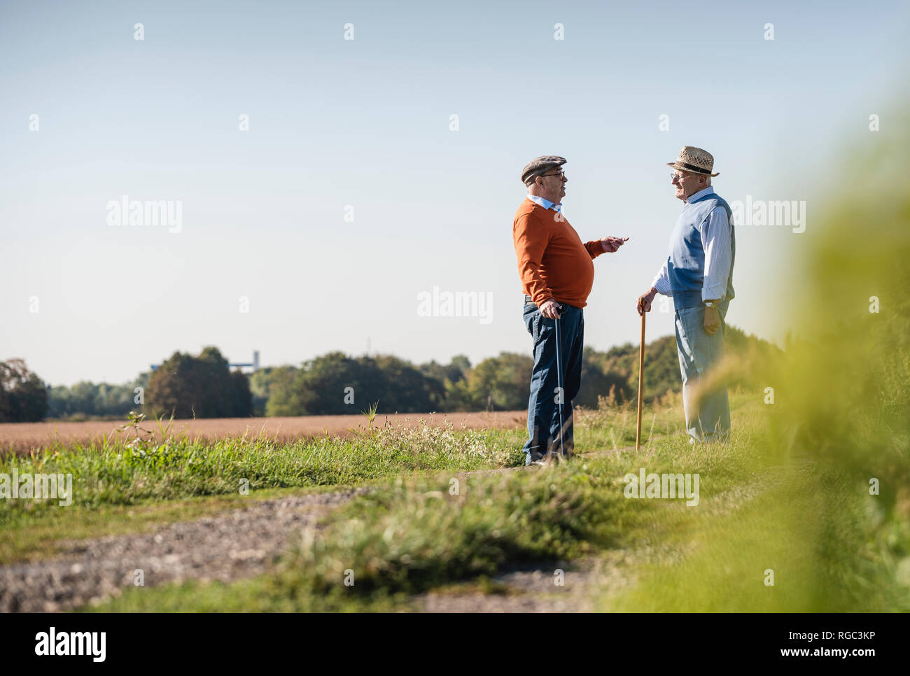 Two people facing each other talking hi-res stock photography and ...