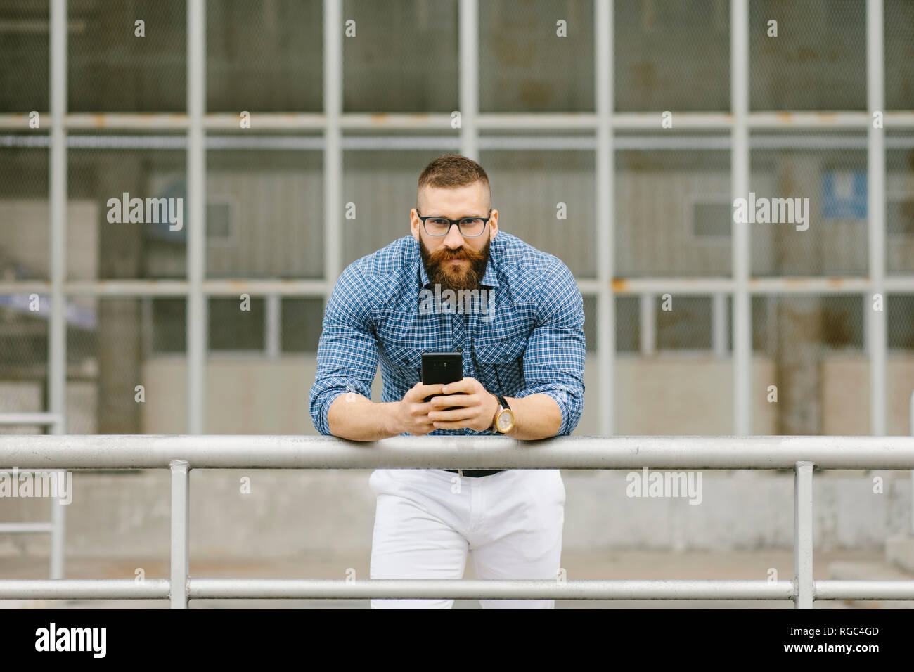 Man leaning railings hi-res stock photography and images - Alamy