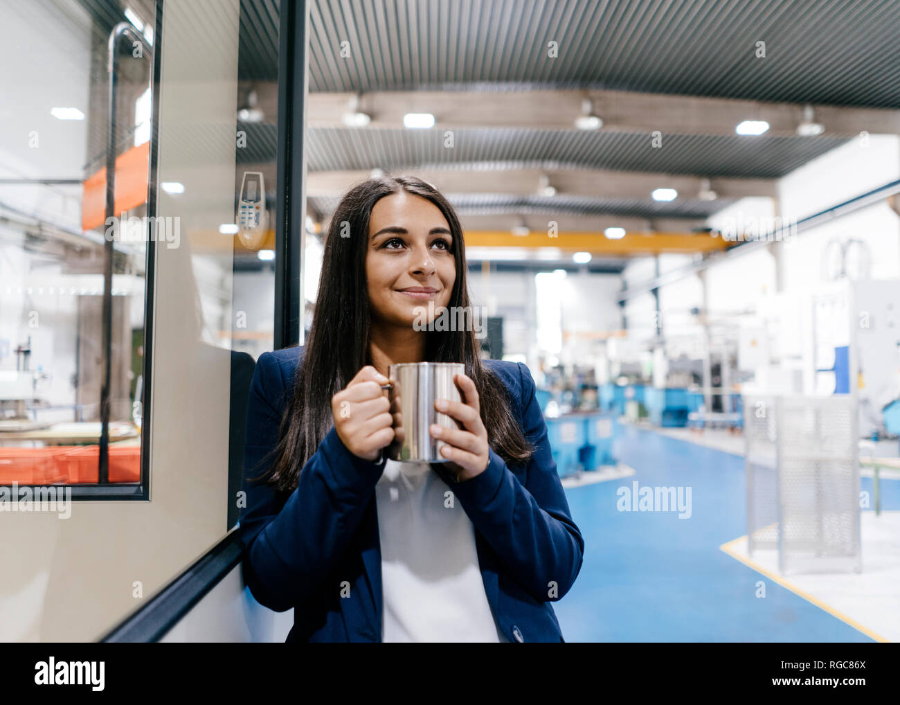 Confident woman working high tech enterprise hi-res stock photography ...