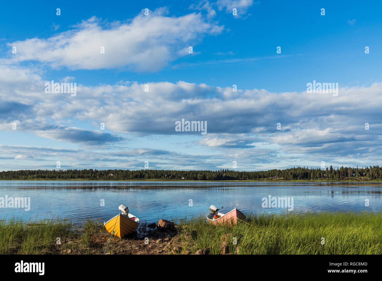 Finland, Lapland, boats moored at the lakeside Stock Photo - Alamy