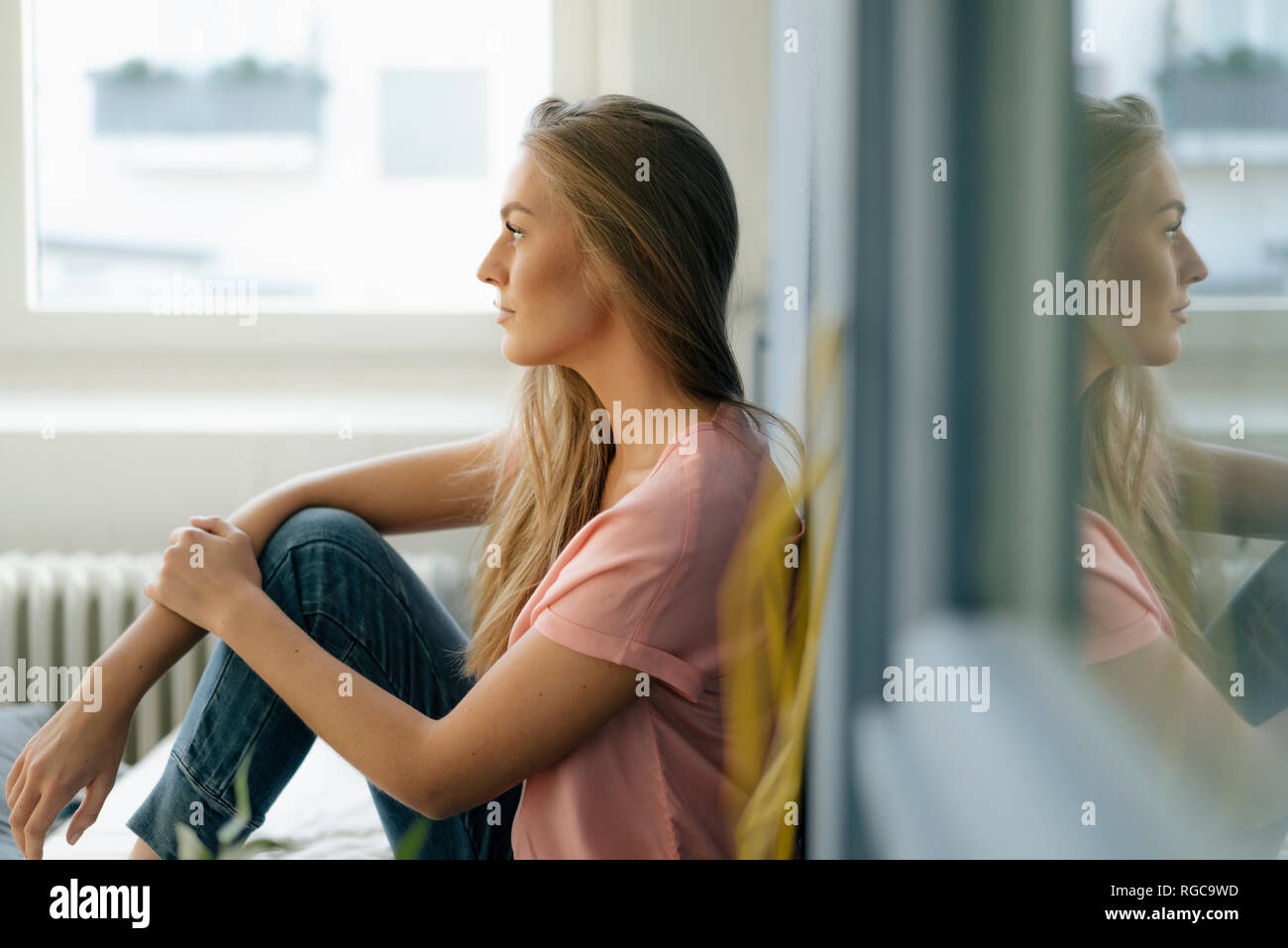 Relaxing home attractive young hi-res stock photography and images - Alamy