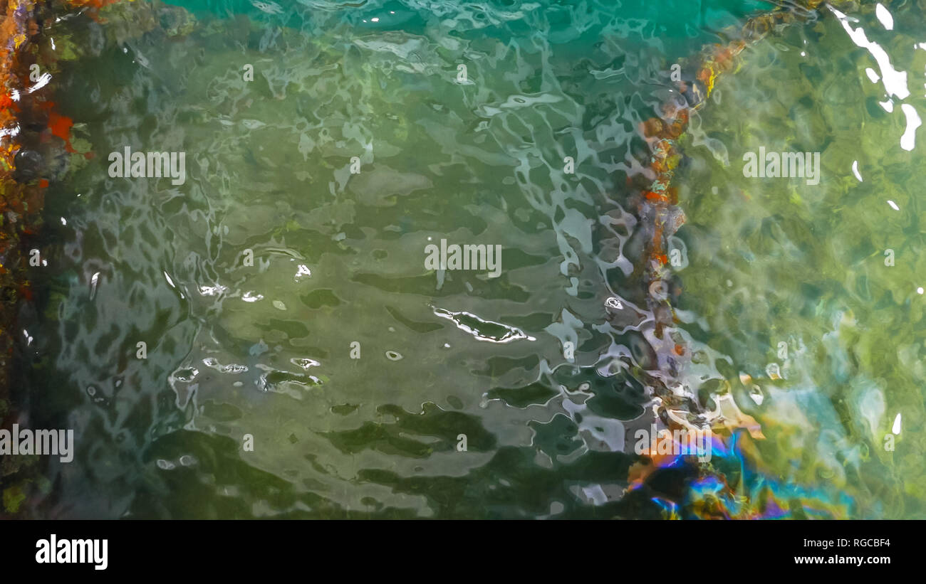 close up of a section of the hull of the uss arizona at pearl harbor ...
