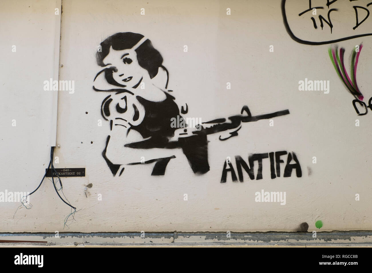 Snow White with an automatic rifle graffiti on a wall in Nicosia,Cyprus ...