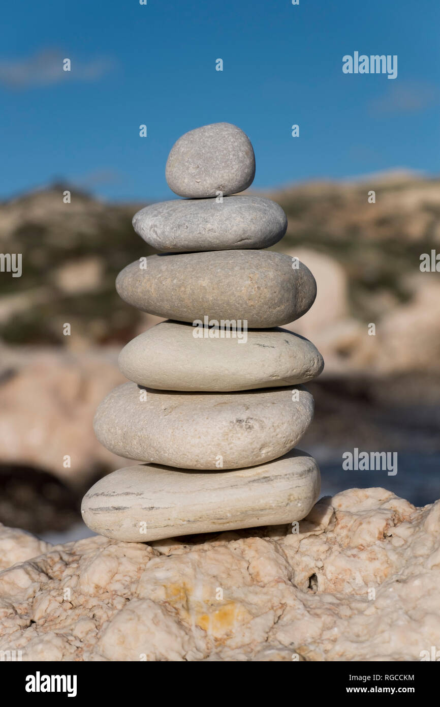 Small stack of smooth rocks at the Aphrodite Birthplace in Cyprus Stock ...
