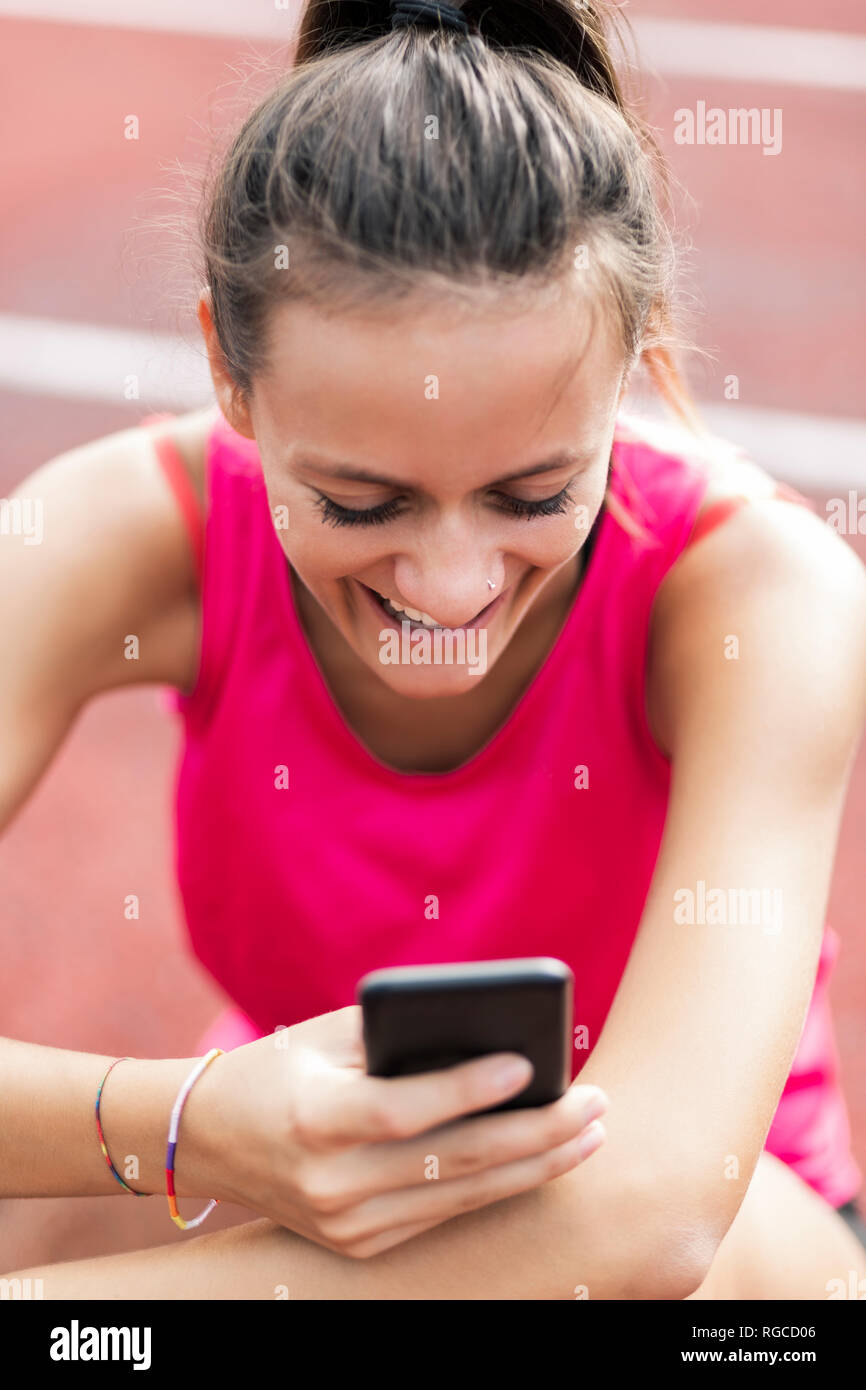 Teenage girl sitting race track hi-res stock photography and images - Alamy