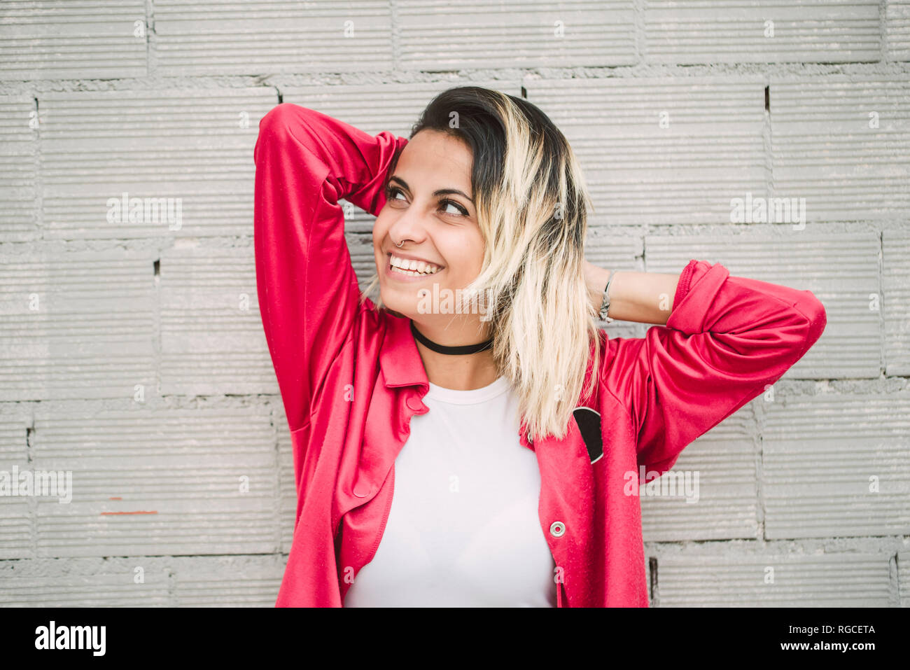 Smiling young woman portrait, Spain Stock Photo - Alamy