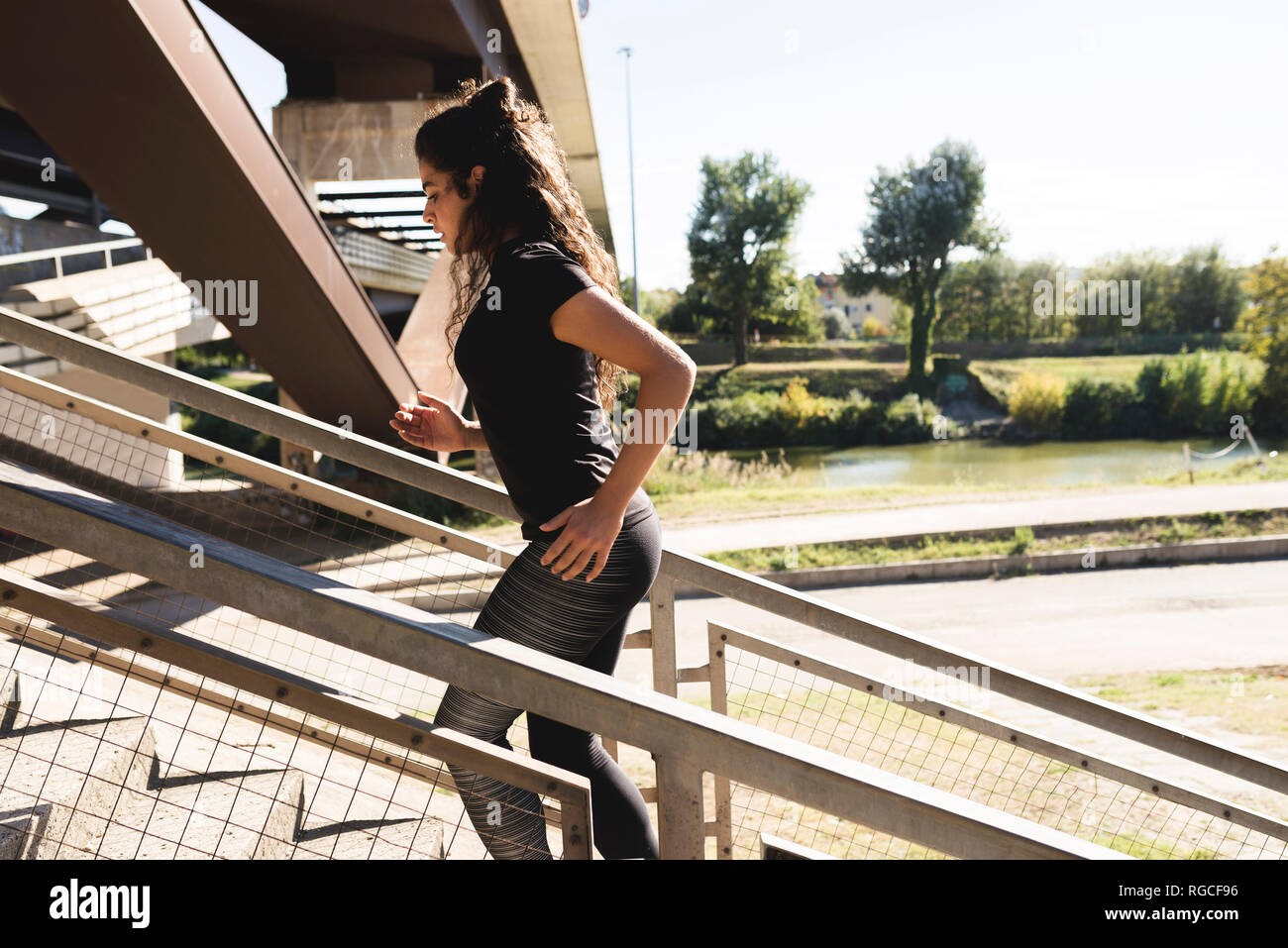 Running on stairs hi-res stock photography and images - Alamy