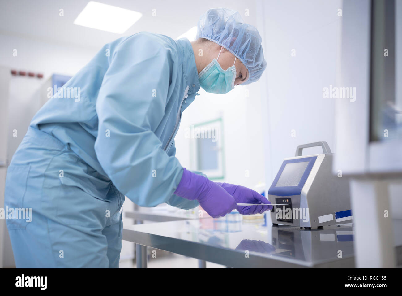 Scientist working in laboratory for drug production Stock Photo - Alamy