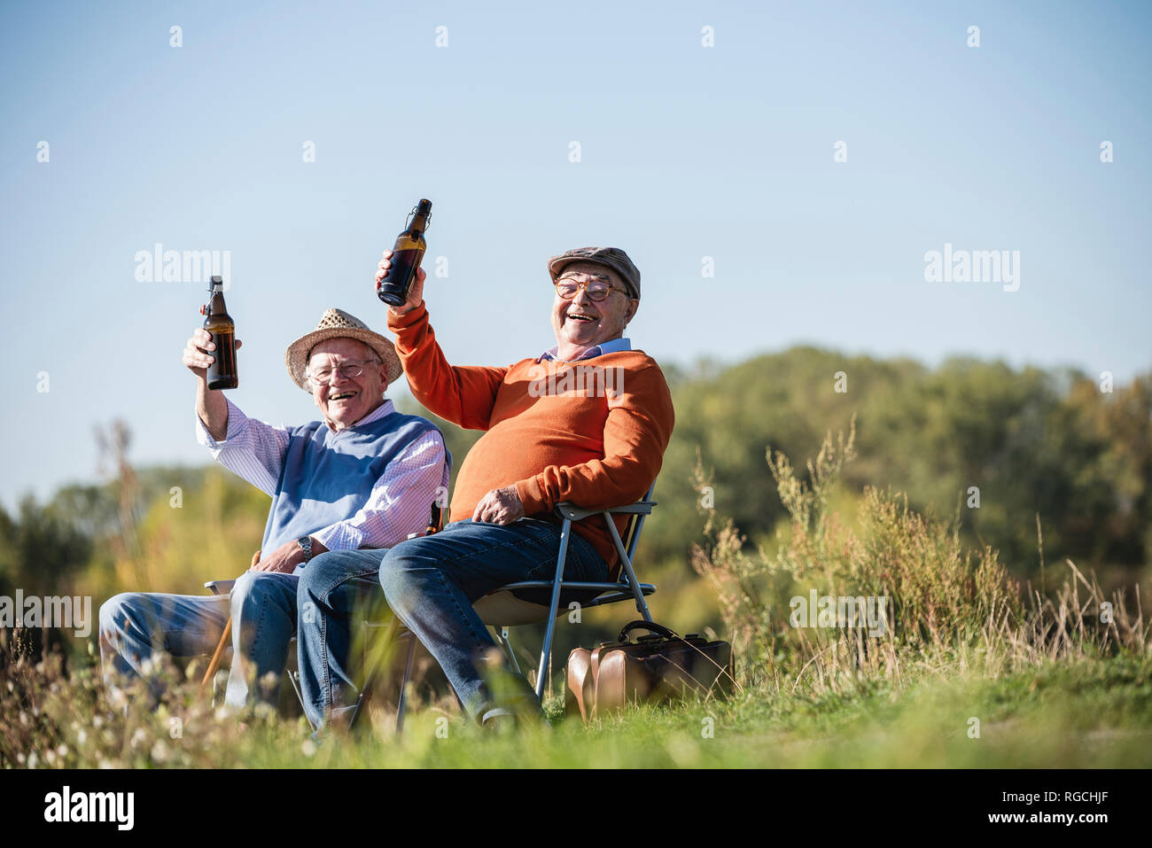Two old friends sitting fields hi-res stock photography and images - Alamy