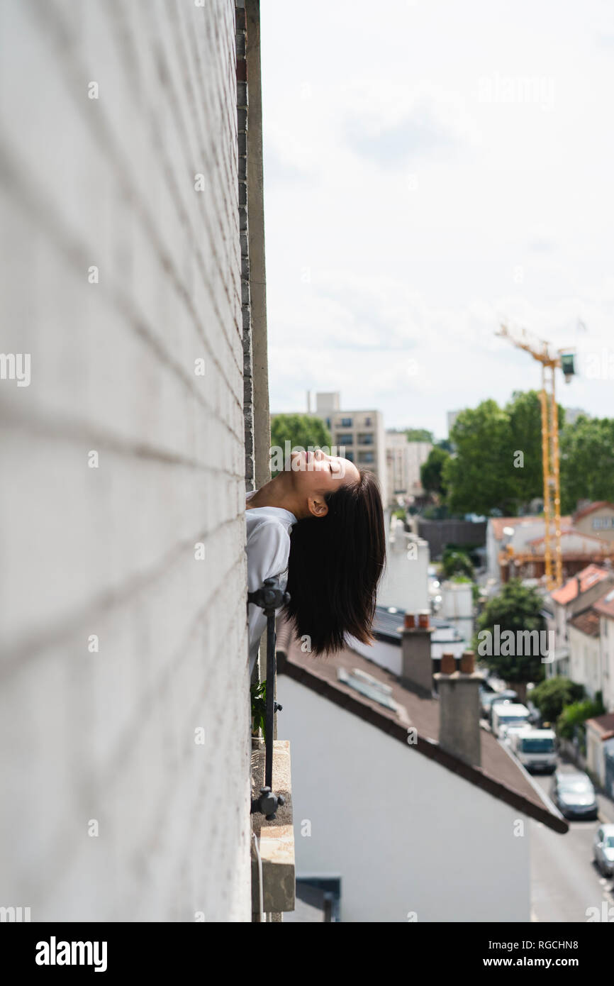 Woman paris window hi-res stock photography and images - Alamy