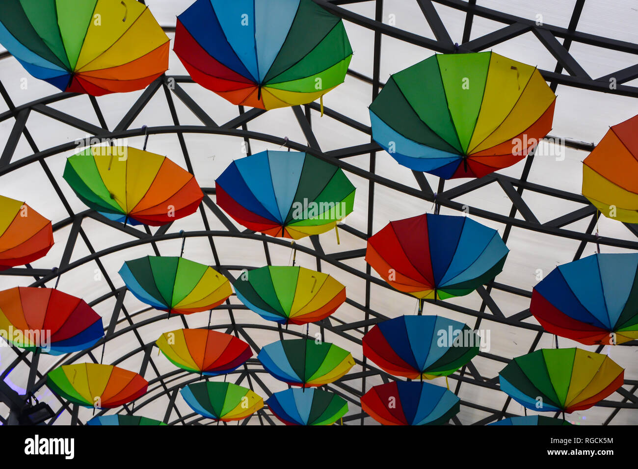 Colorful unbrellas background. Nice roof decoration Stock Photo - Alamy