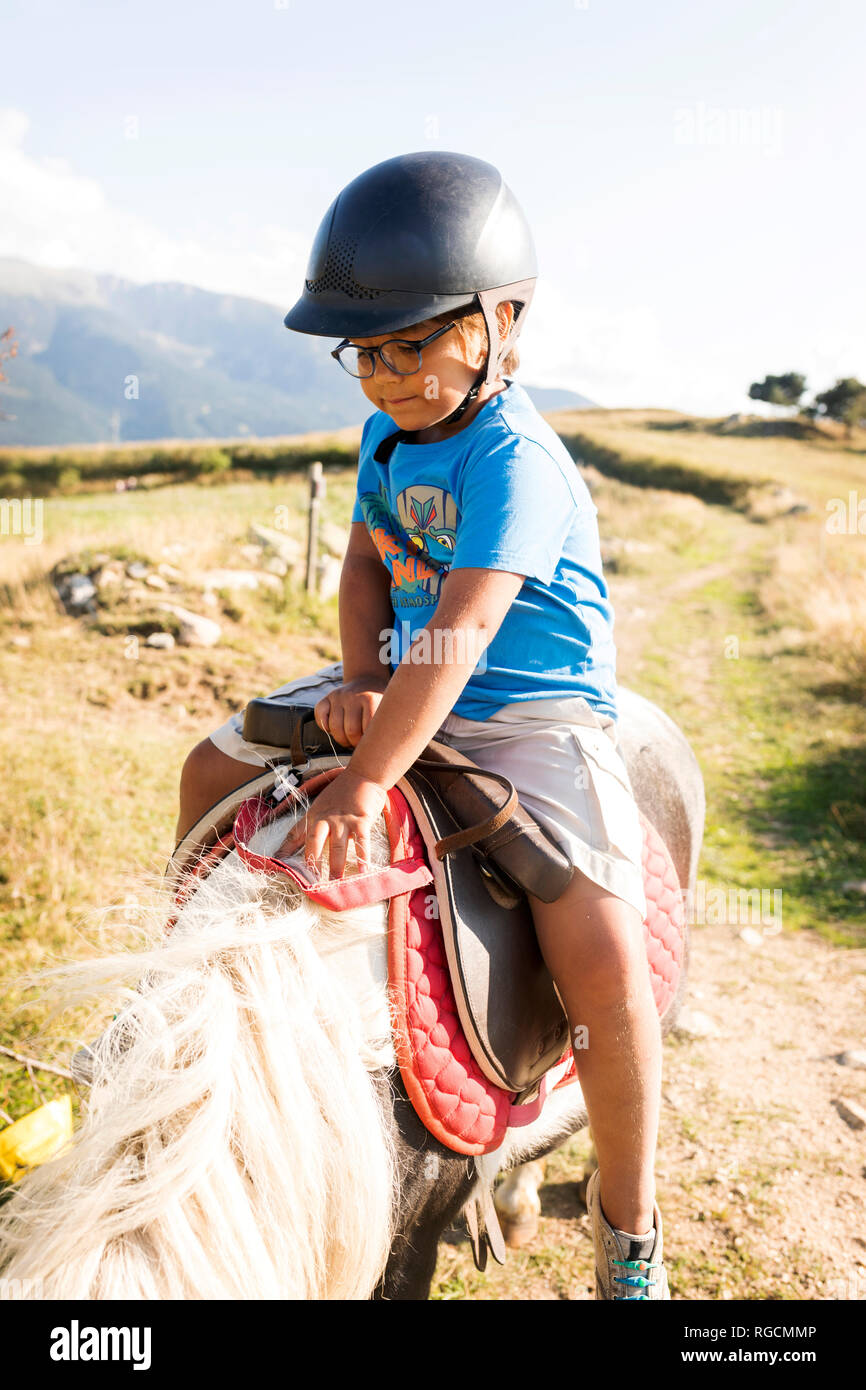 Pony boy riding hi-res stock photography and images - Alamy