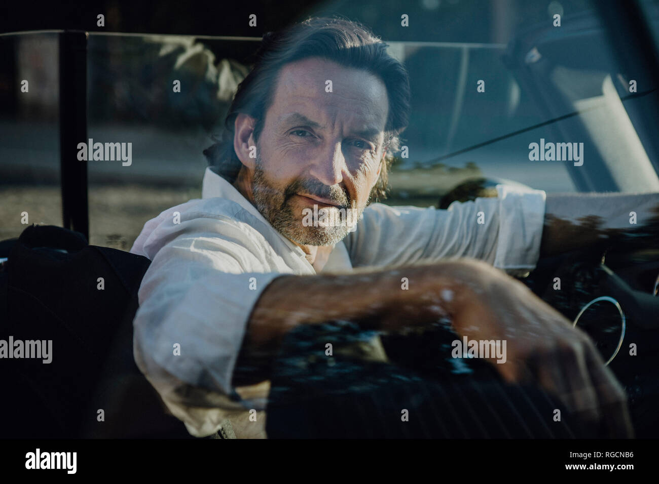 Man driving convertible in Munich, Bavaria, Germany Stock Photo - Alamy