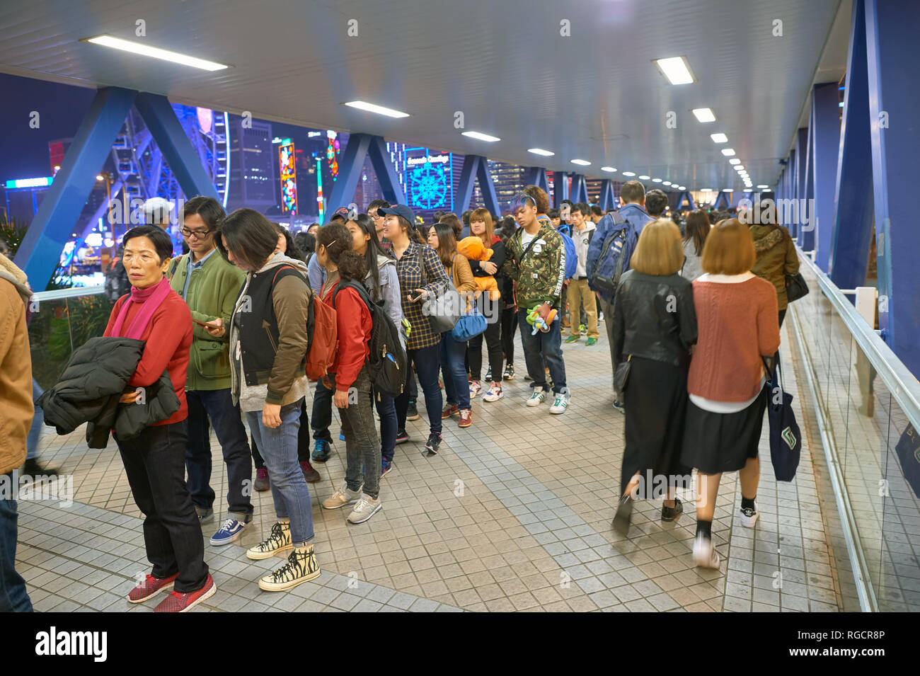 HONG KONG - CIRCA DECEMBER, 2015: people queue to get on Star Ferry in ...