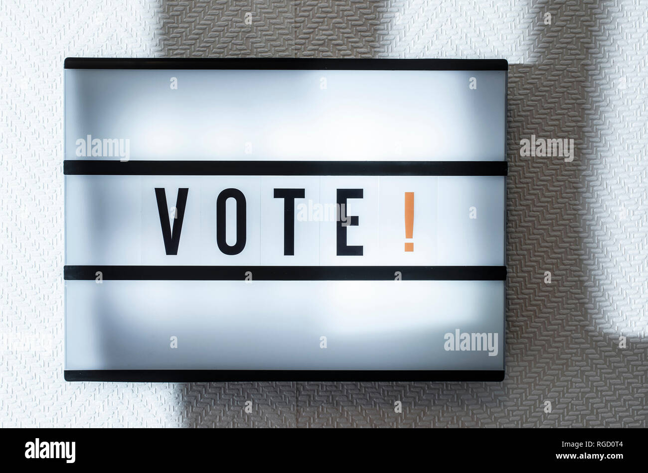 Message Vote on illuminated board. Voting concept with text. Daylight ...