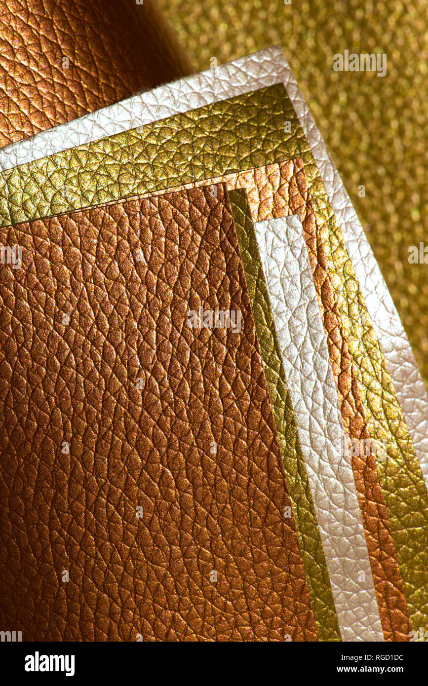 Shiny golden colour leather bright background. Geometric shapes ...