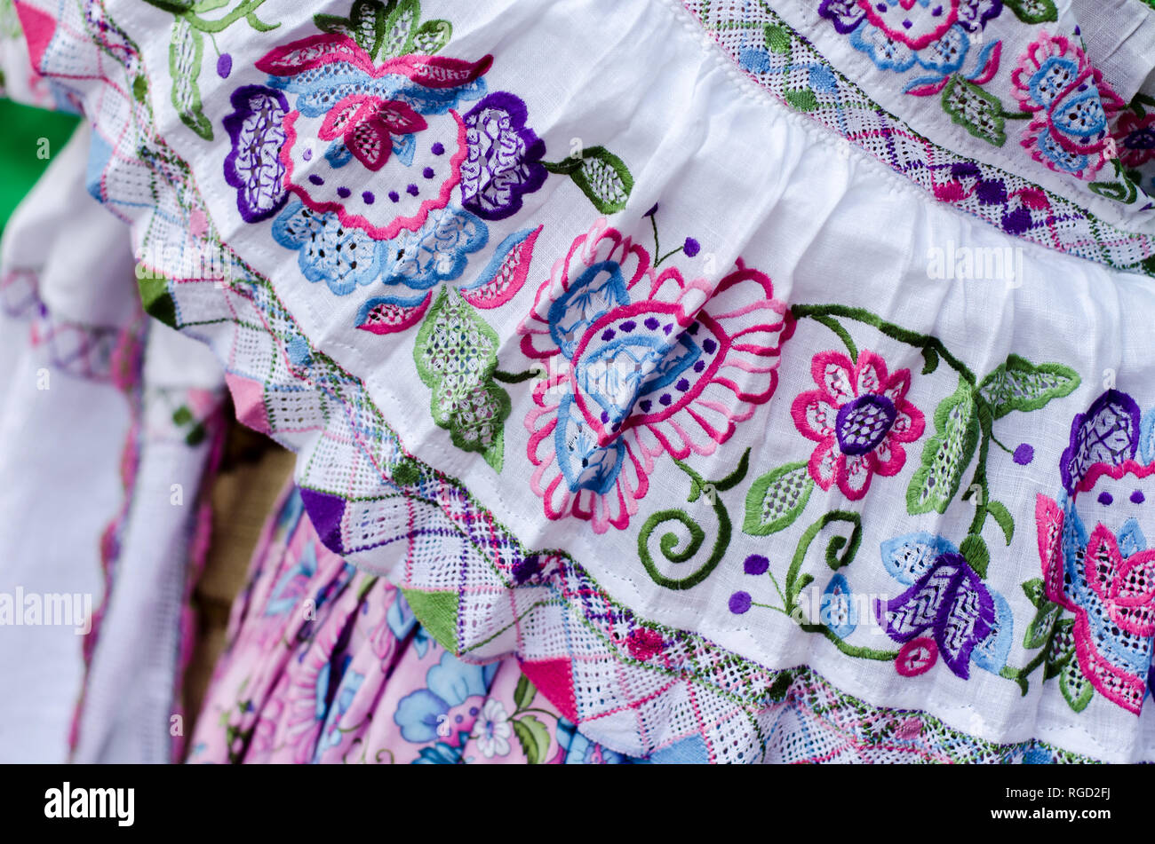 Details of the typical Panamanian dress known as pollera. The pattern is all handmade using ...