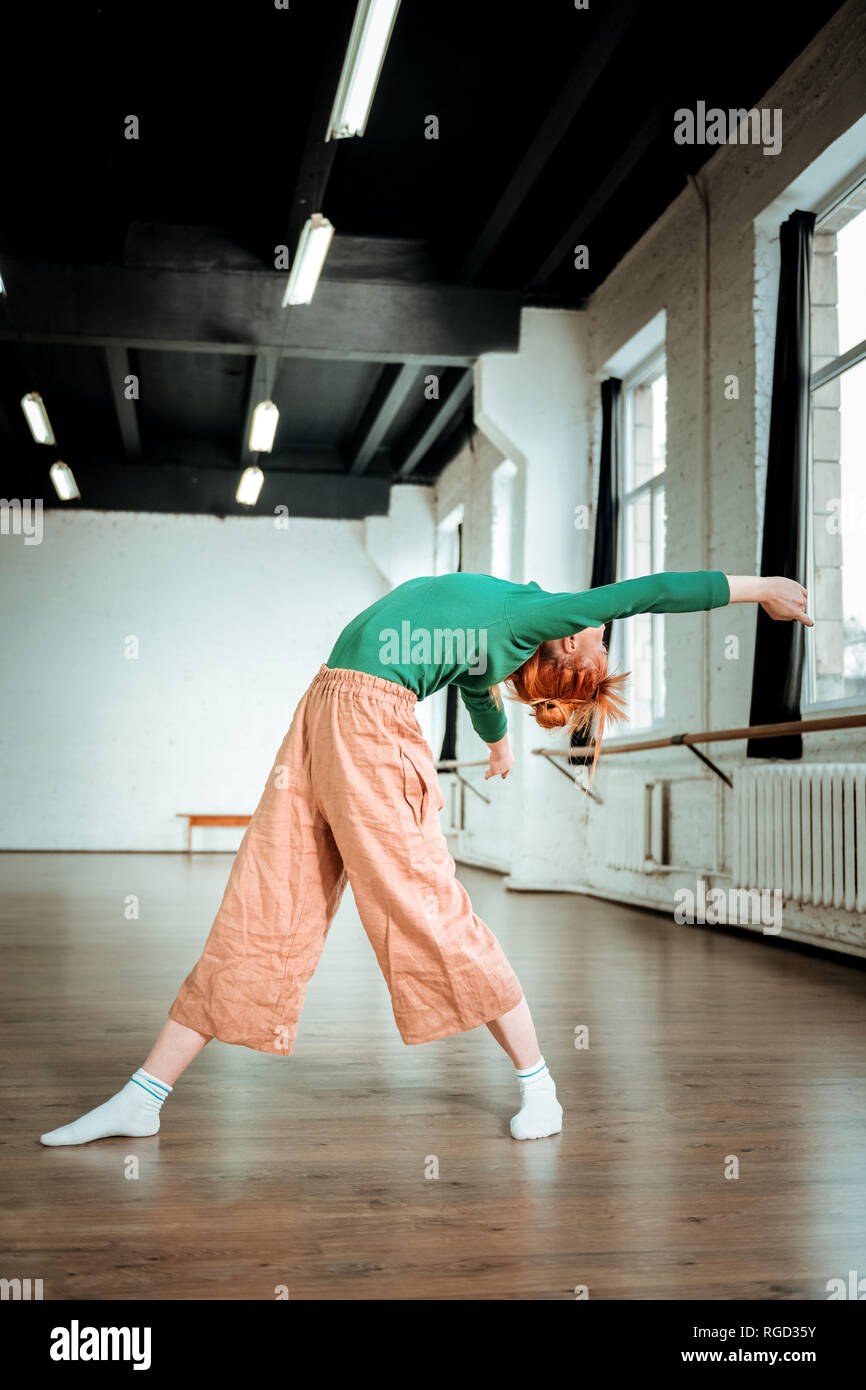 Beautiful young woman arching back hi-res stock photography and images ...