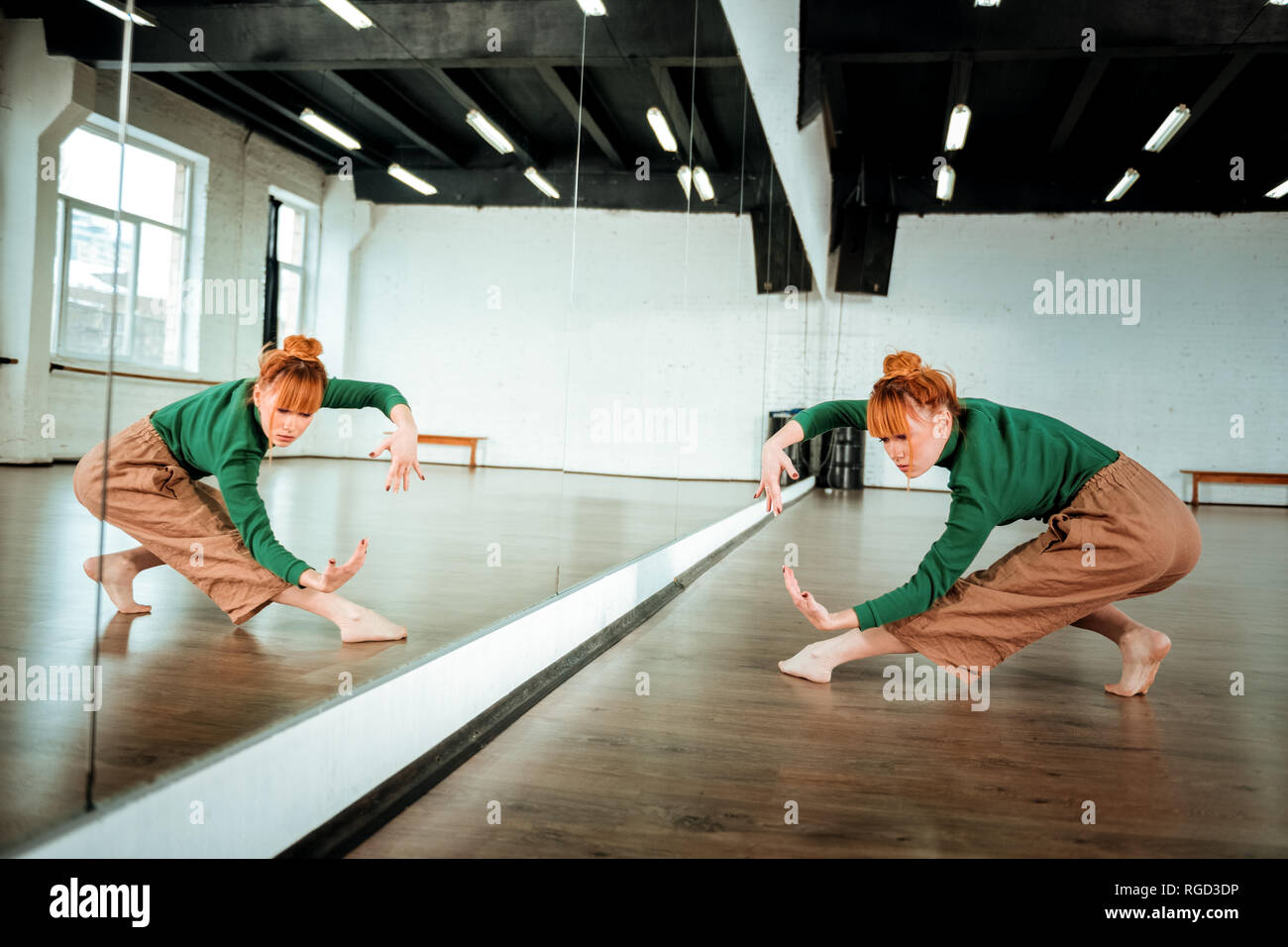 Young red haired ballet dancer hi-res stock photography and images - Alamy