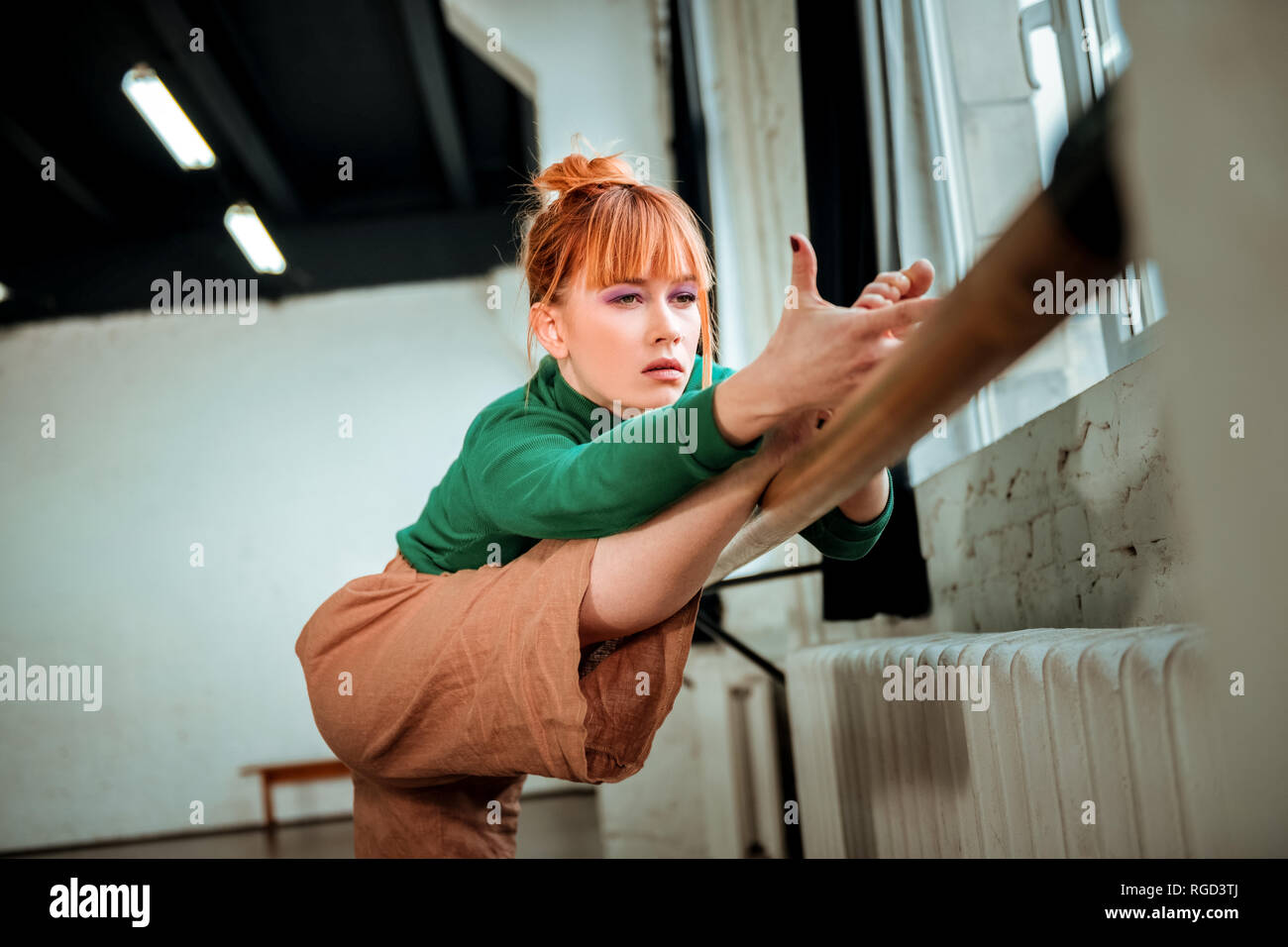 Young red haired ballet dancer hi-res stock photography and images - Alamy