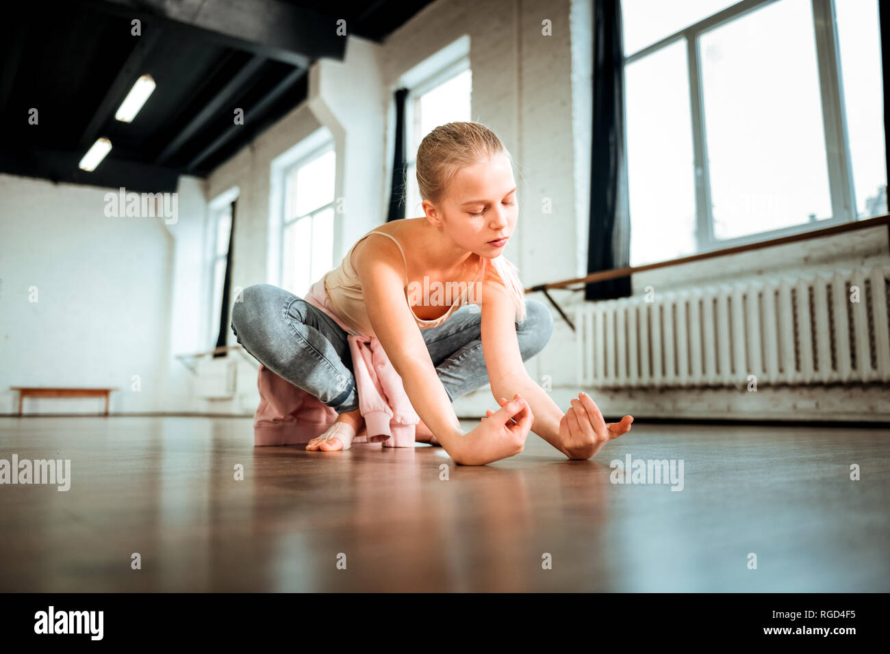 Beautiful blond teenager from generation z looking thoughtful Stock ...