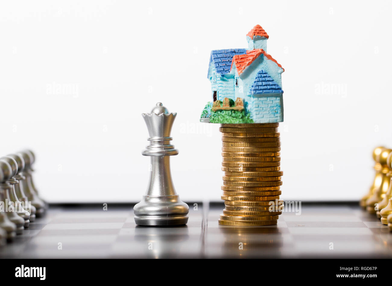 Chess and small house Stock Photo - Alamy