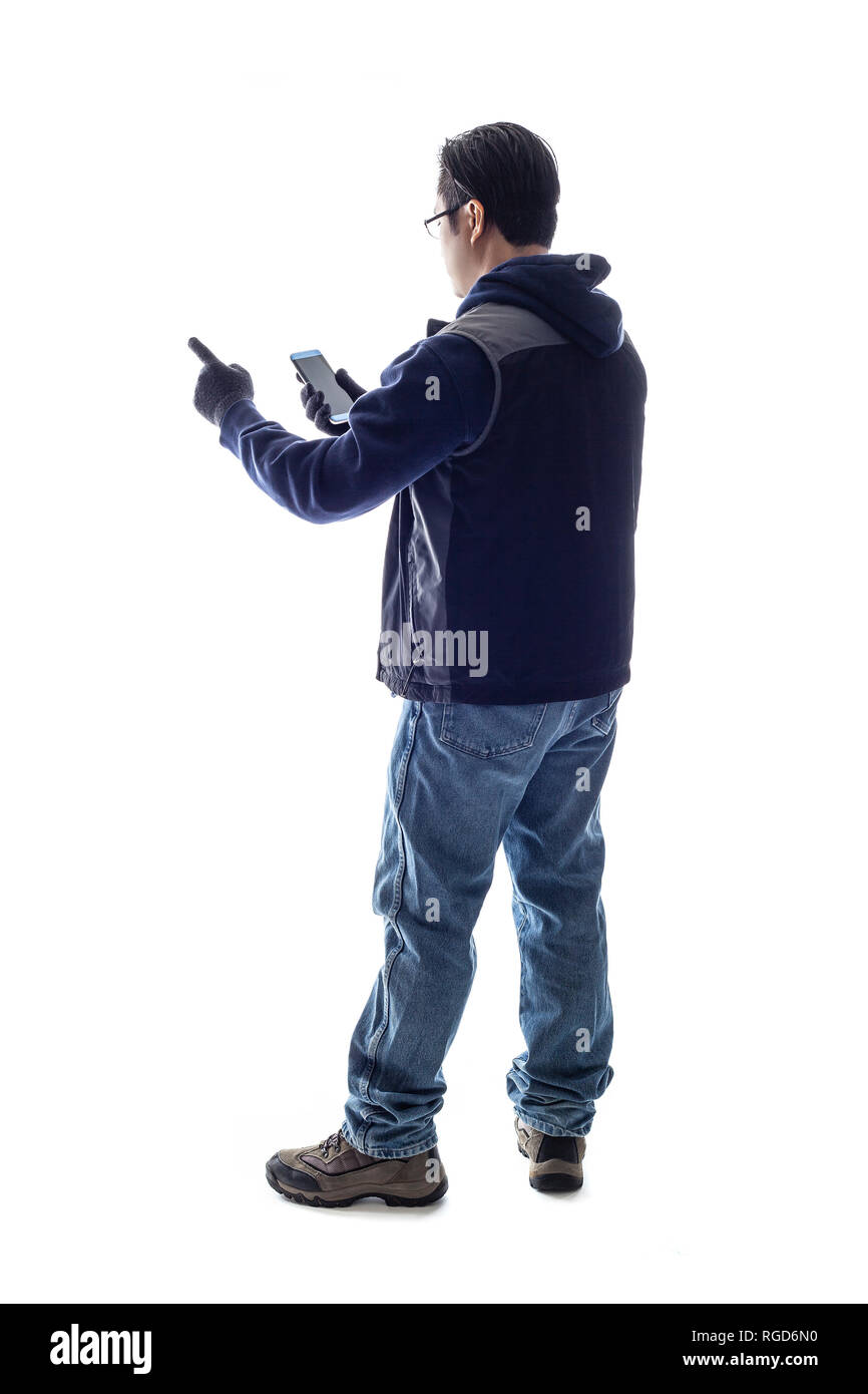 Lost male hiker or tourist using gps navigation on cell phone to look ...