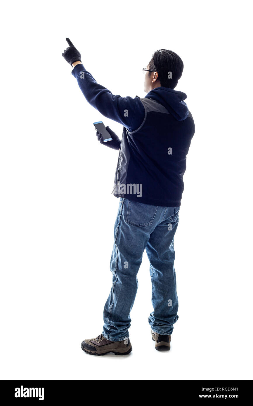 Lost male hiker or tourist using gps navigation on cell phone to look ...