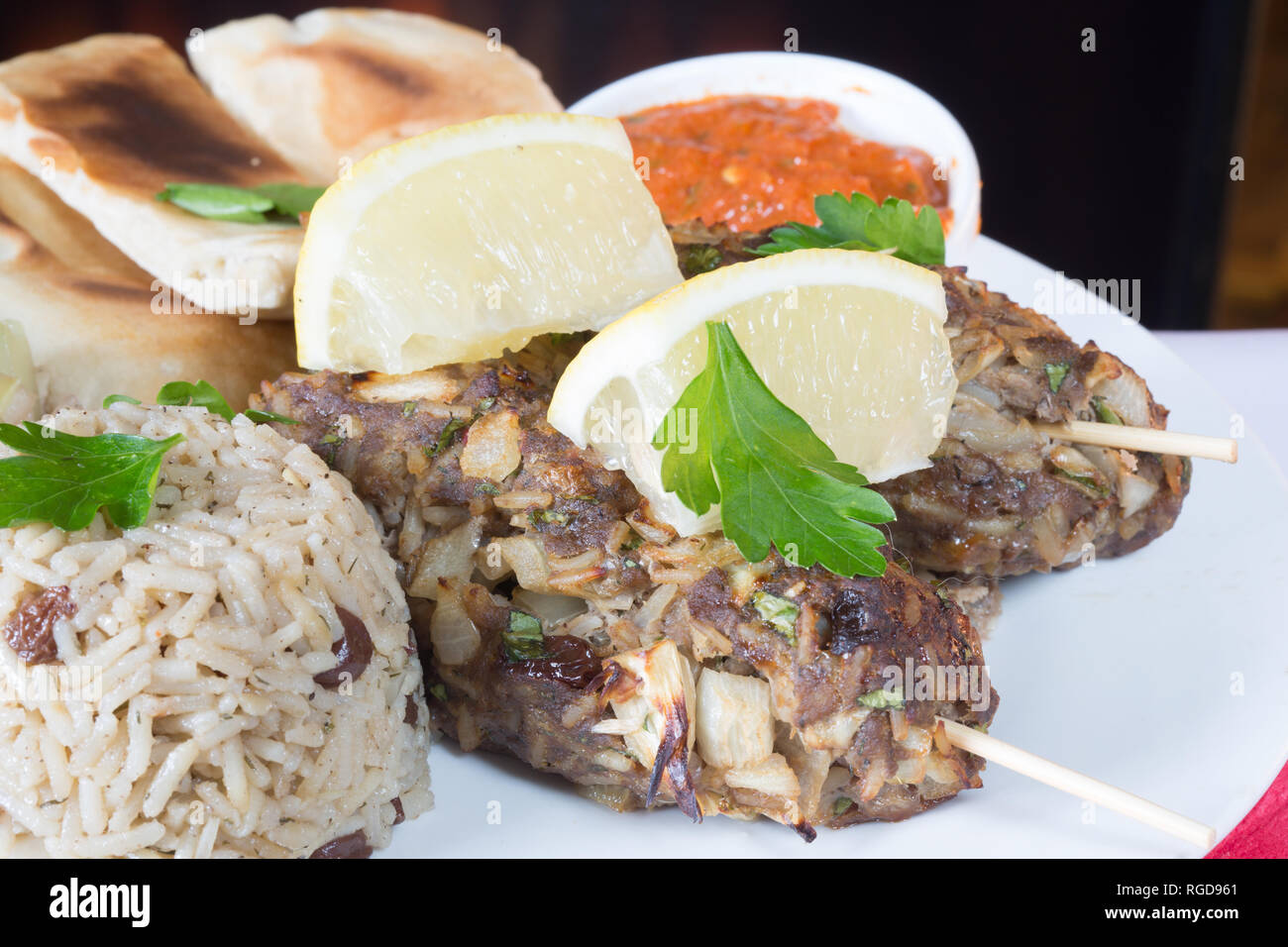 A Turkish dish of Lamb Sis Kebap, with fragrant rice, side salad and ...