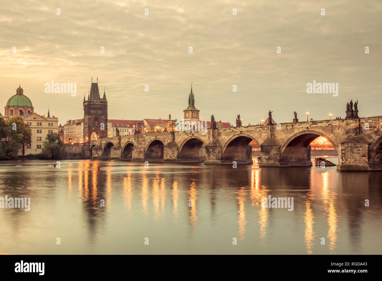 Vintage Famous Prague Landmarks - towers and bridge at night time with ...