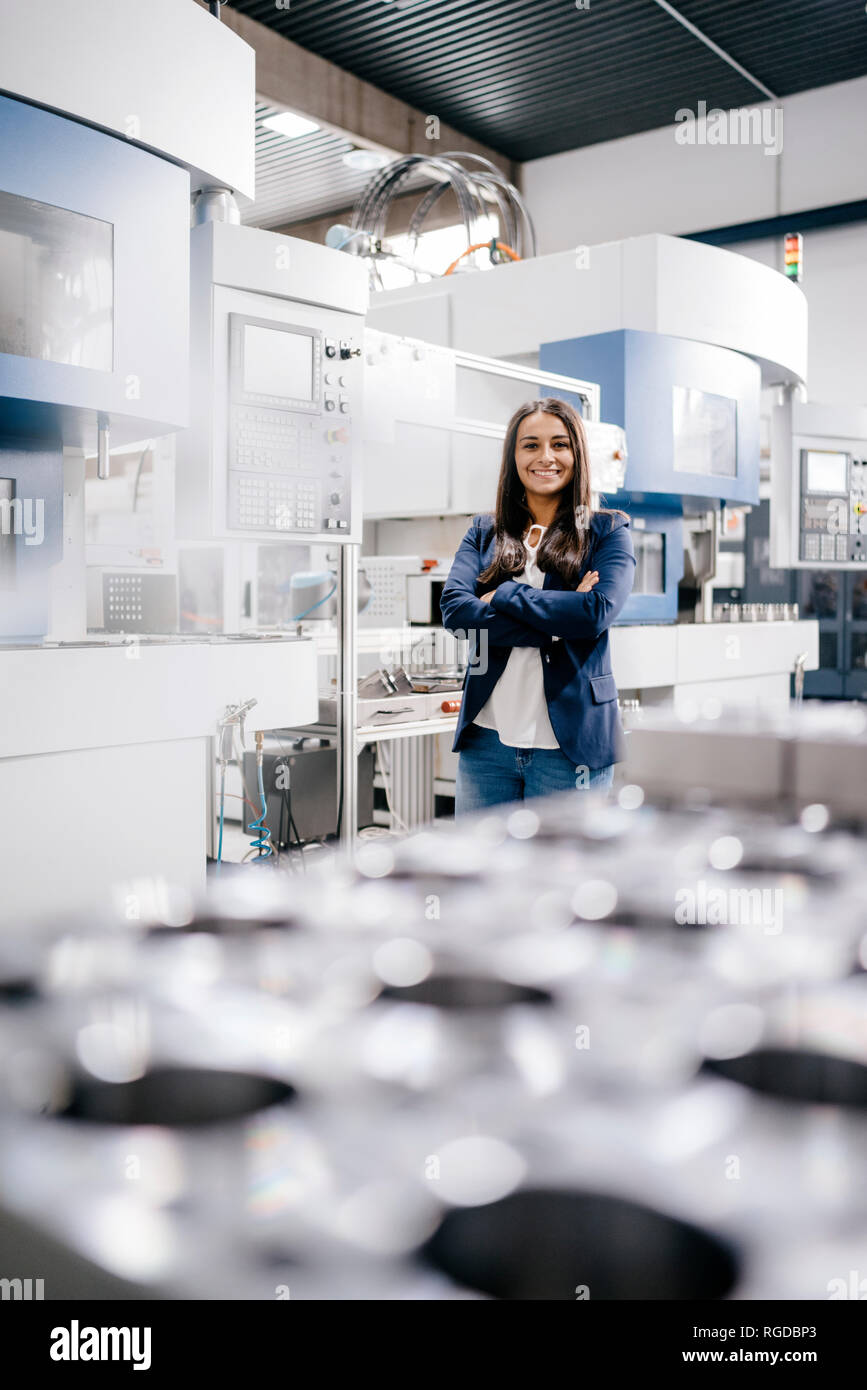 Confident woman working high tech enterprise hi-res stock photography ...