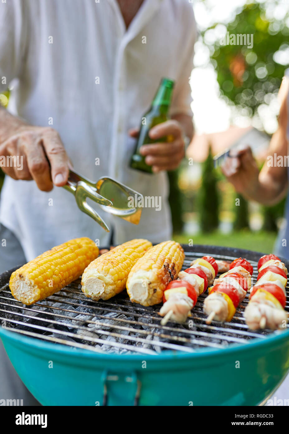 Corn cob meat skewer grill barbecue garden hi-res stock photography and ...