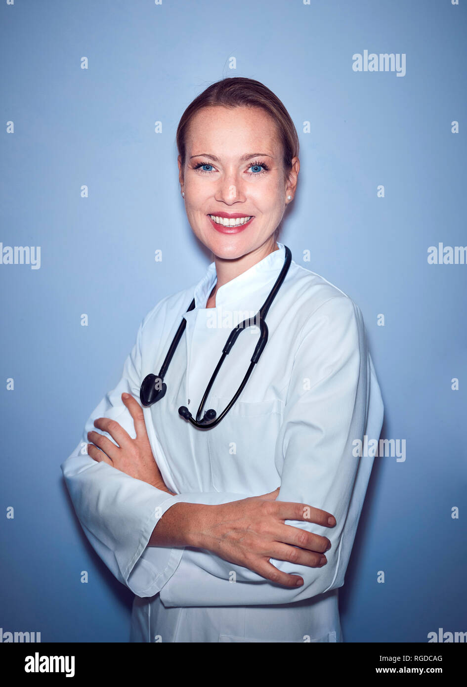 Portrait of smiling female doctor with stethoscope Stock Photo - Alamy