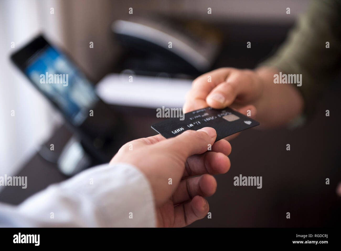 Handing hi-res stock photography and images - Alamy