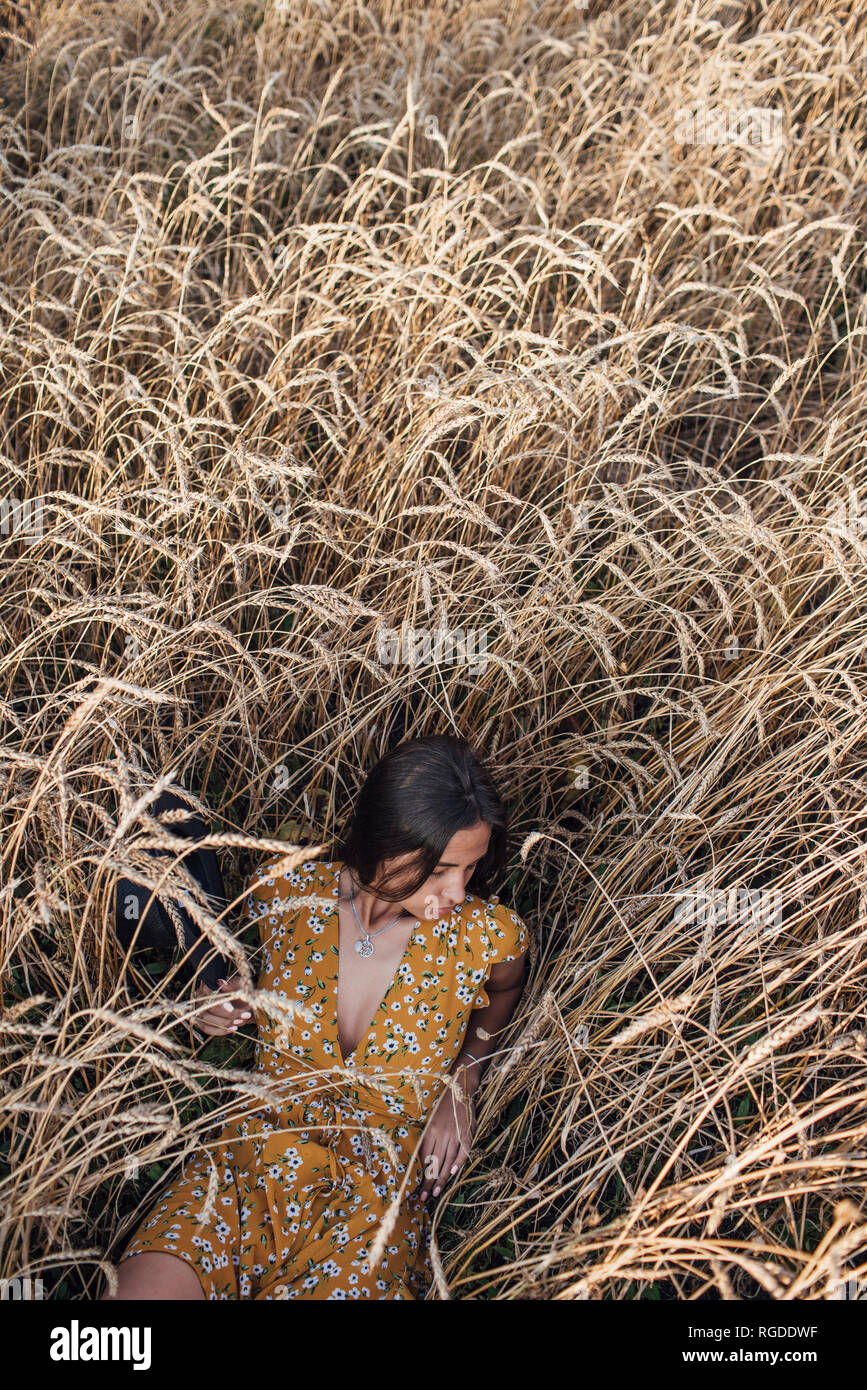 Woman lying in the sun hi-res stock photography and images - Alamy