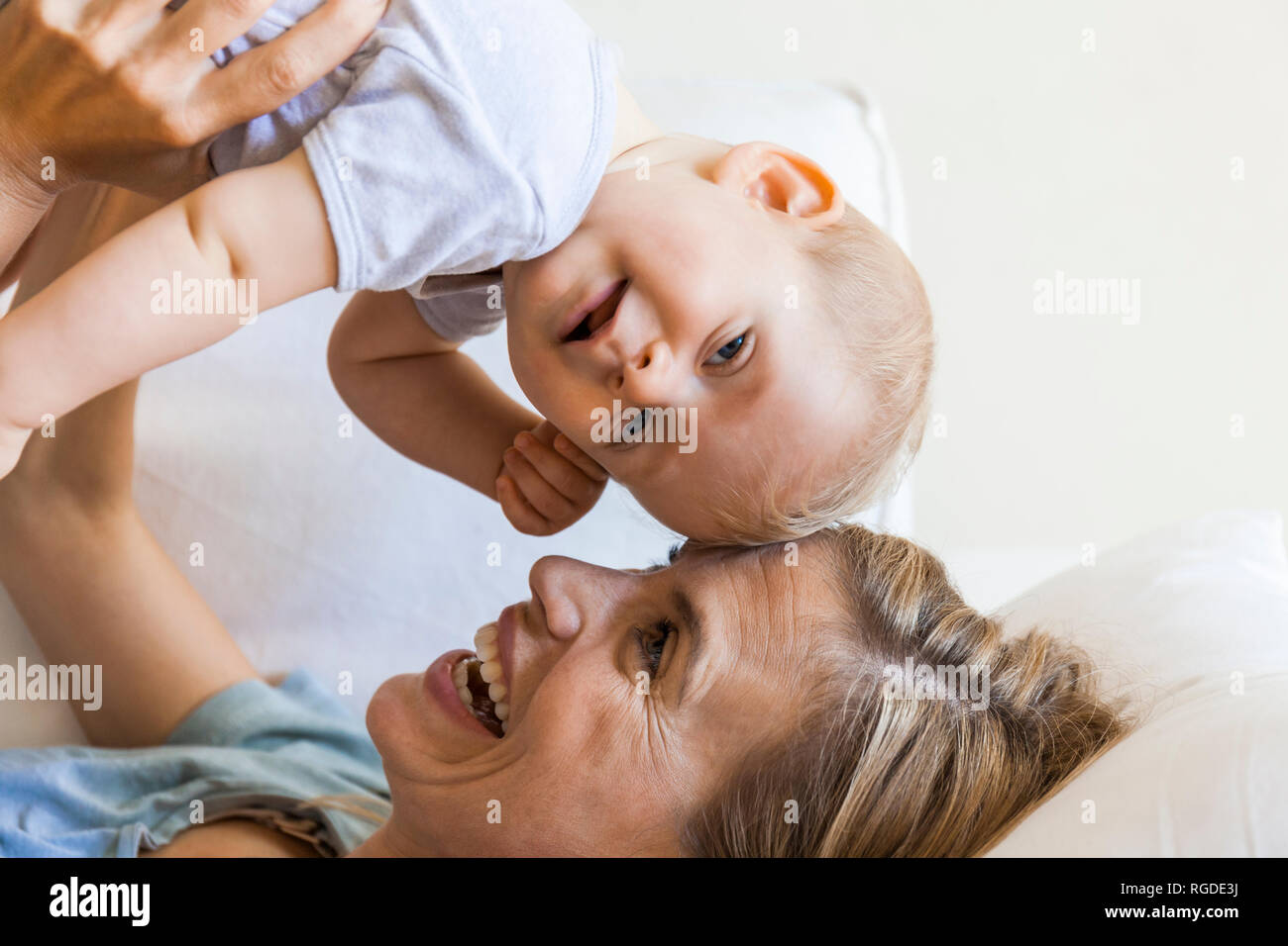 Mother cuddling hi-res stock photography and images - Alamy
