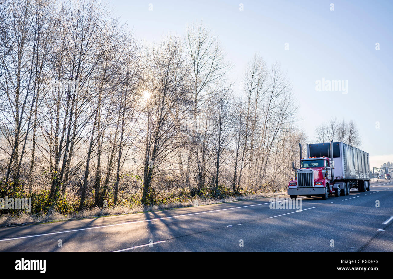 Red big rig day cab classic American idol bonnet semi truck with ...