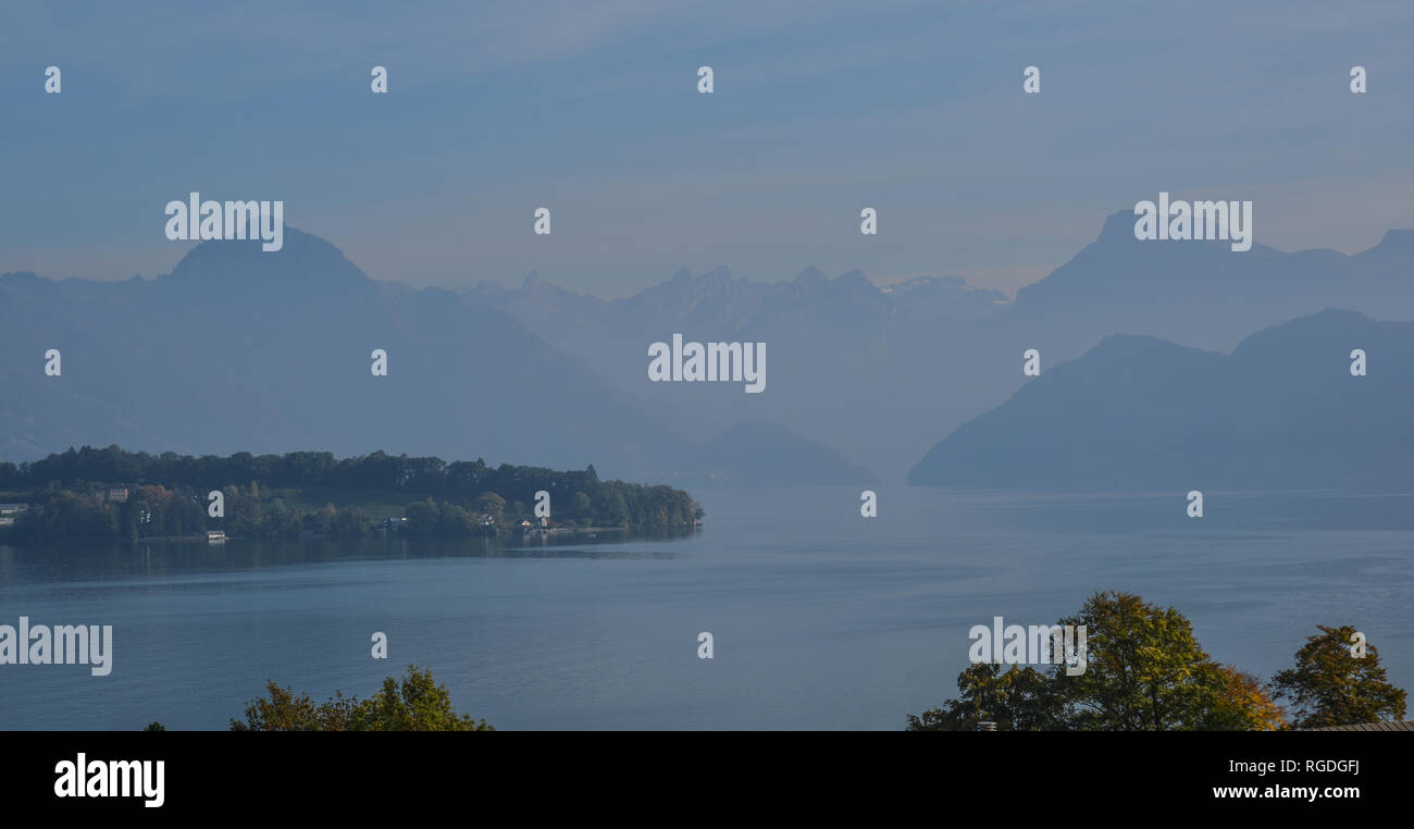 A beautiful, calm morning landscape of lake and mountains in the ...