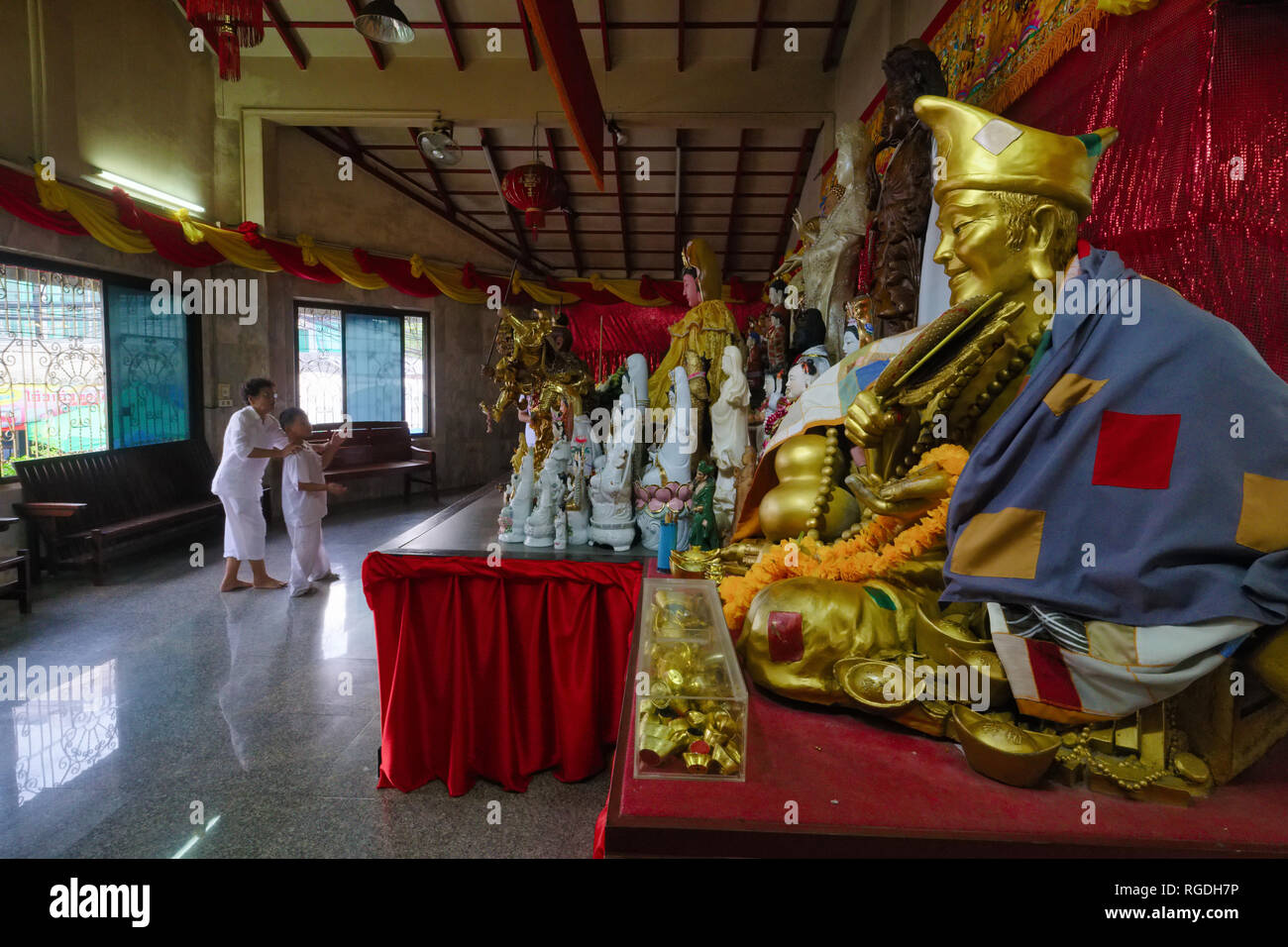 Religious Taoist figures in a prayer room of Pud Jaw (Pud Chor) Shrine ...