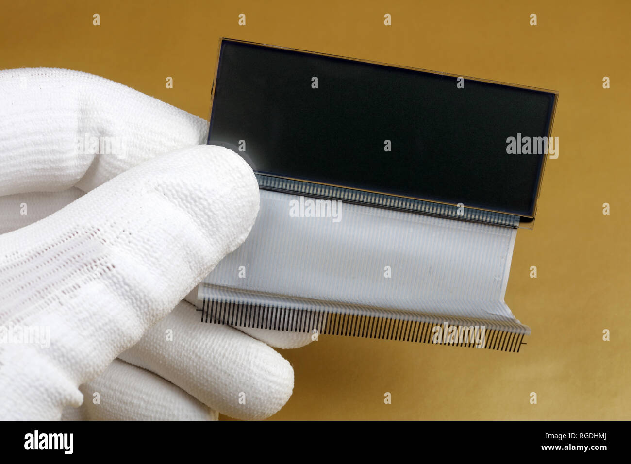 A technician controls the quality of a modern lcd screen for digital ...