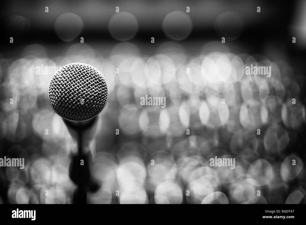 Black and white of Microphone on background blurred Stock Photo - Alamy